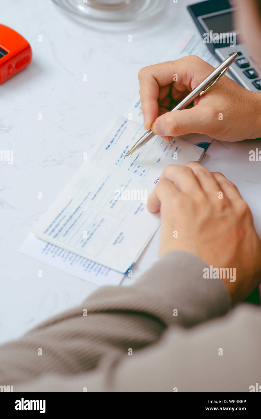 Cheque book signature hi-res stock photography and images - Alamy