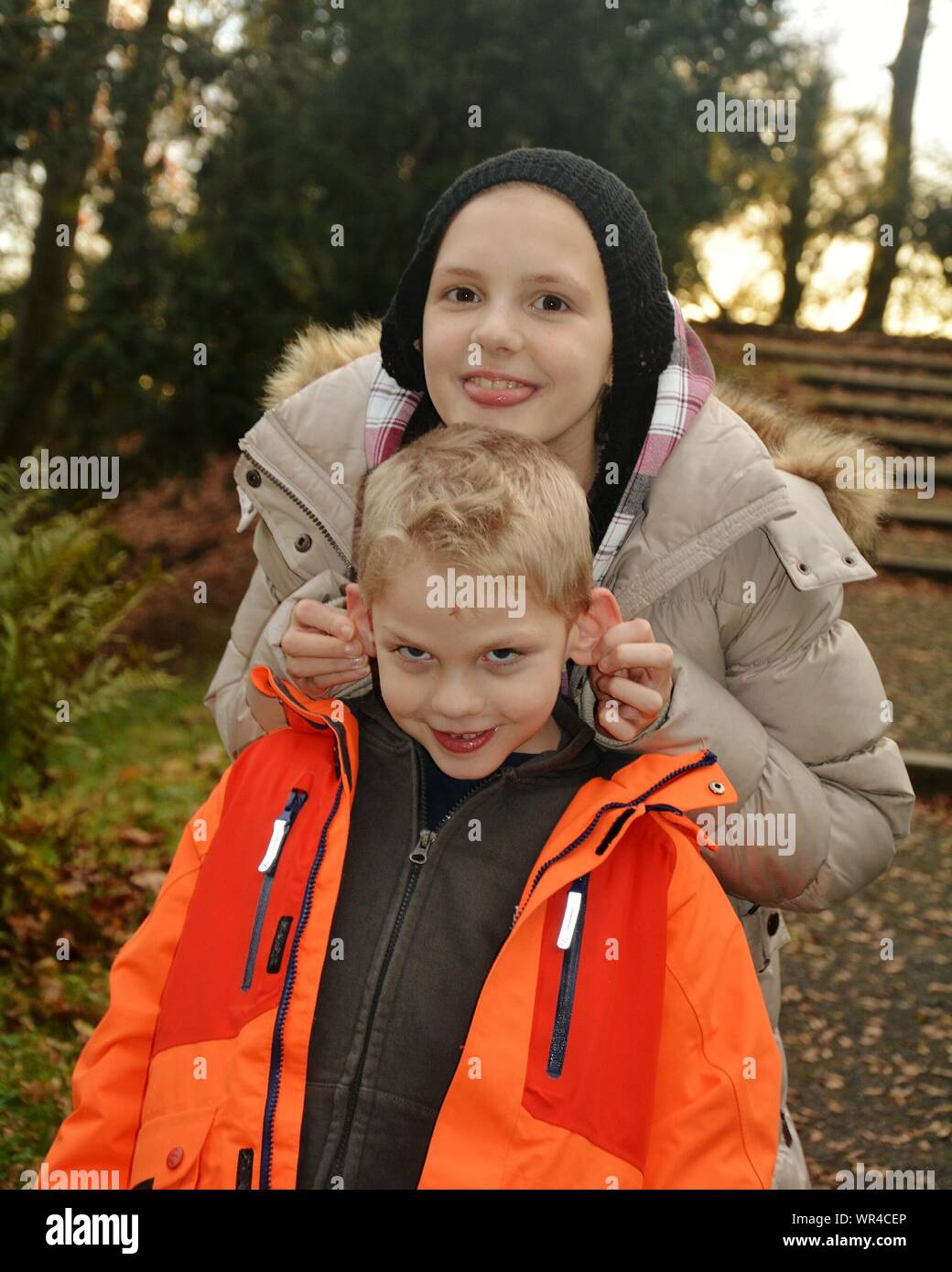 Pulling ear hi-res stock photography and images - Alamy