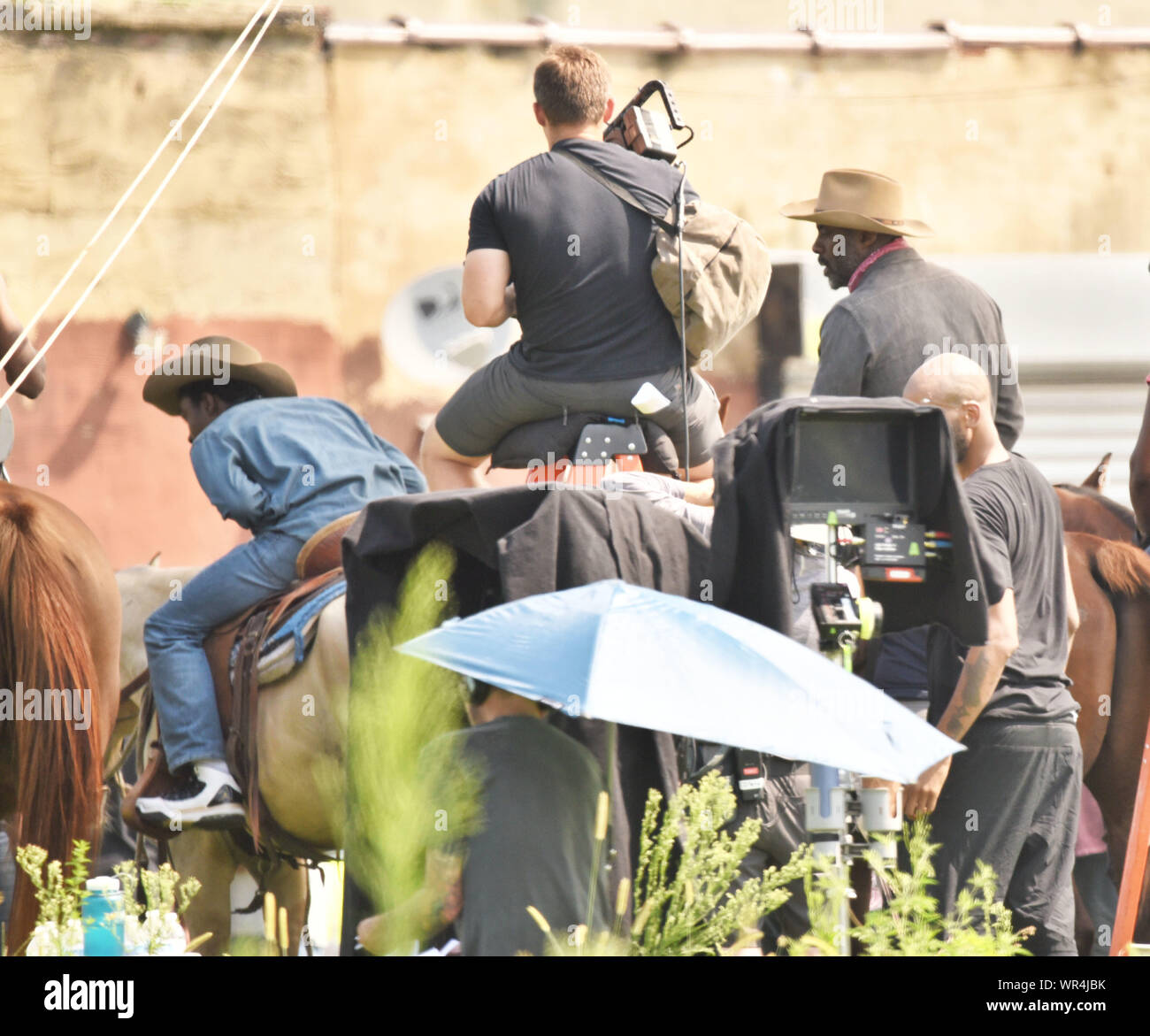 Idris Elba on the set of 'Ghetto Cowboy' in Philadelphia, Pennsylvania ...