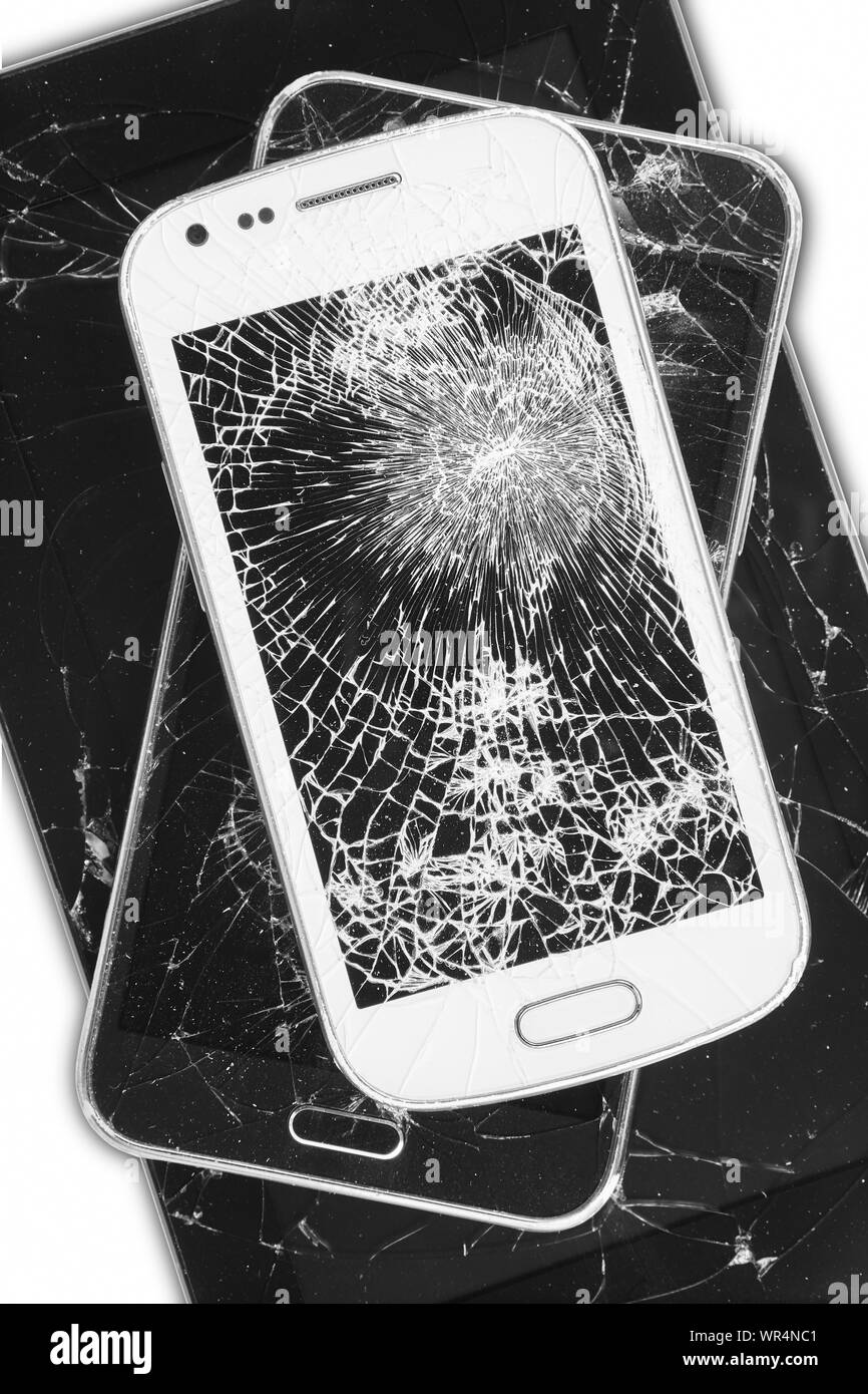 Smartphones with damaged screens isolated on white. Repair equipment ...