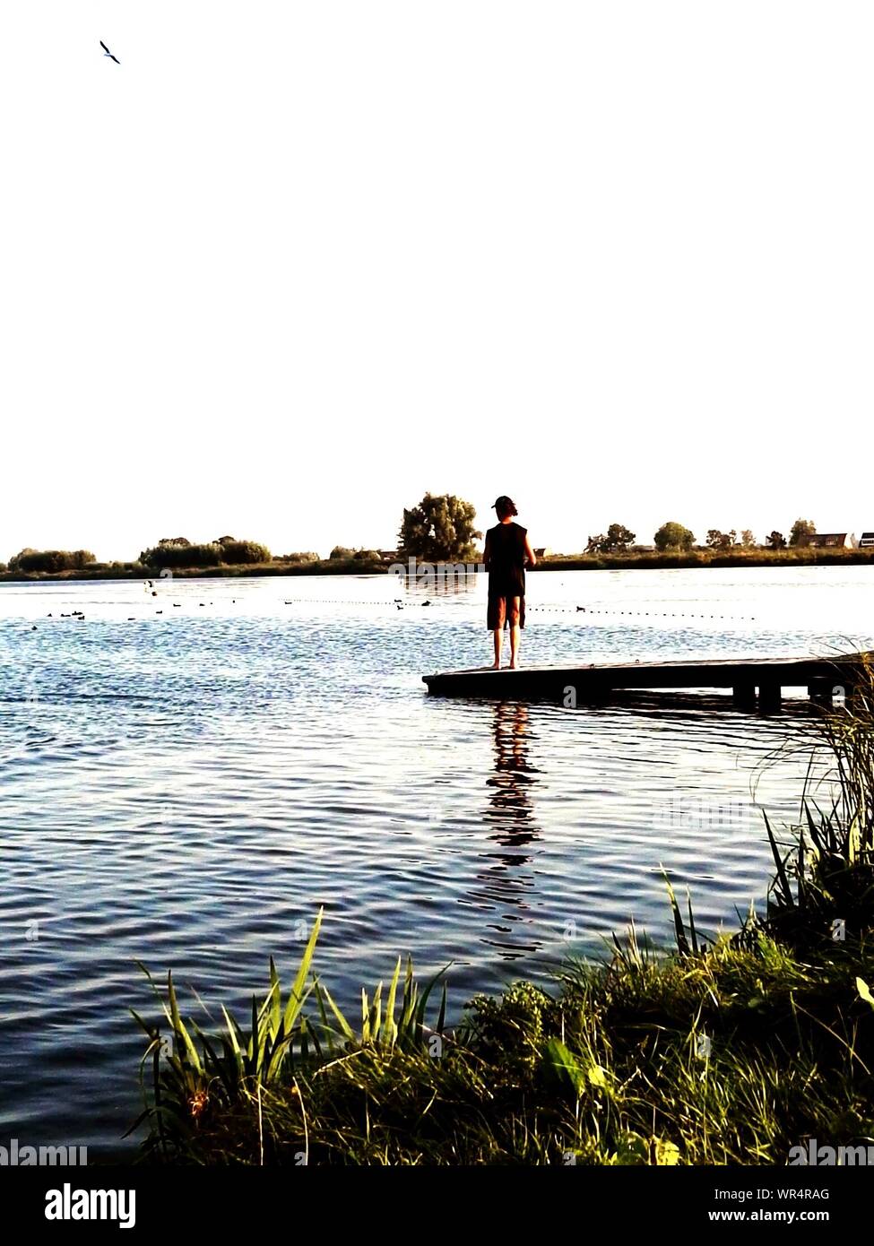 Man floating water silhouette hi-res stock photography and images - Alamy