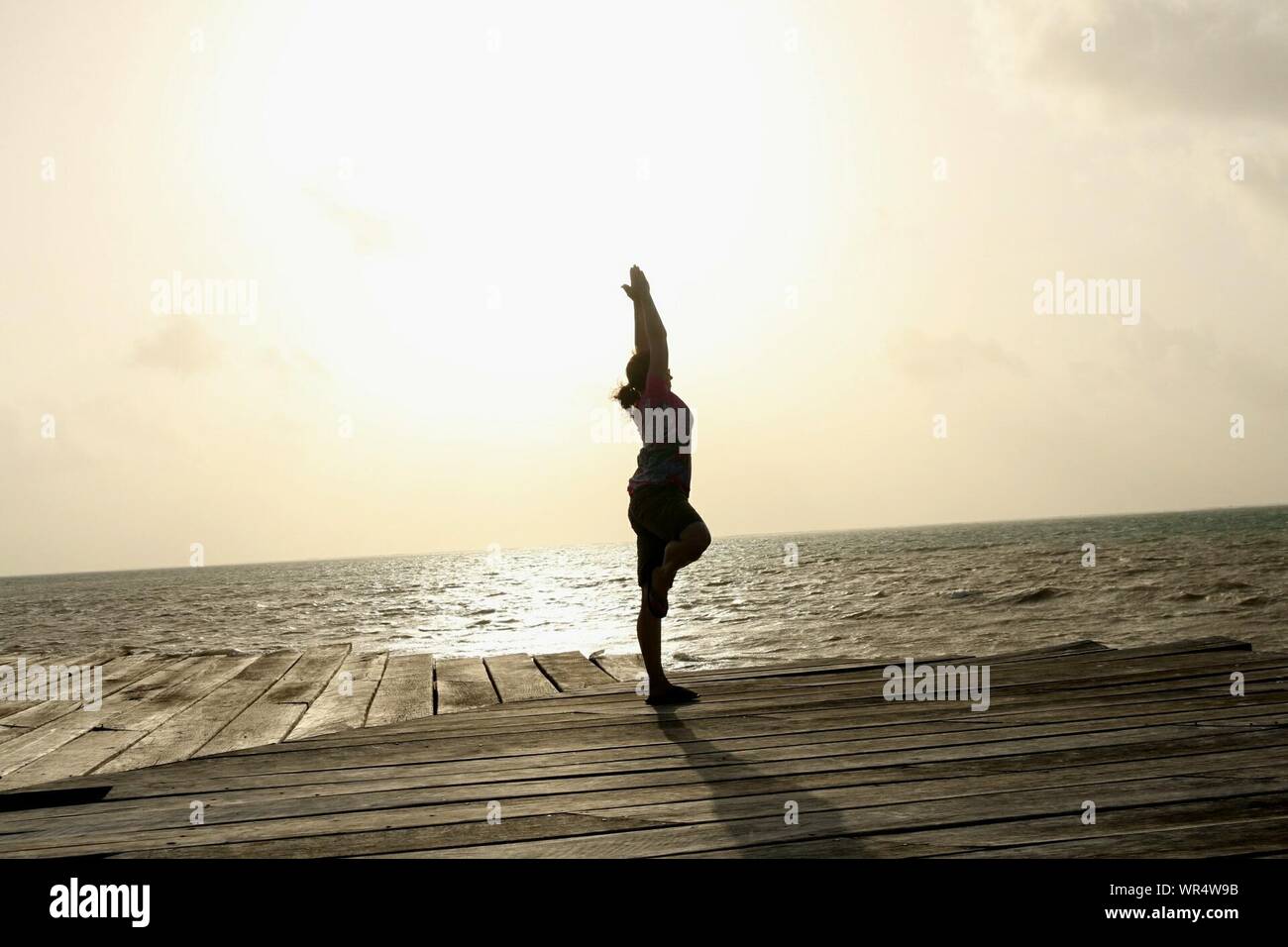 Standing tree pose hi-res stock photography and images - Alamy