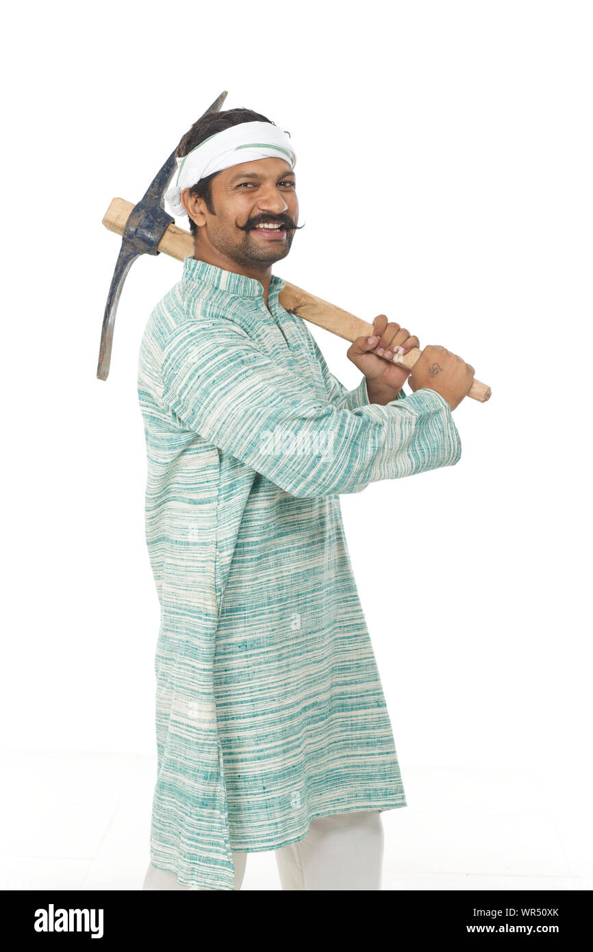 Farmer standing with a pick axe isolated on white background Stock ...