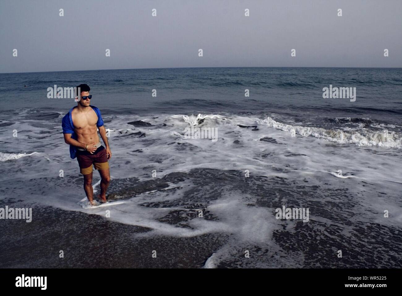 Muscular men in sea hi-res stock photography and images - Alamy