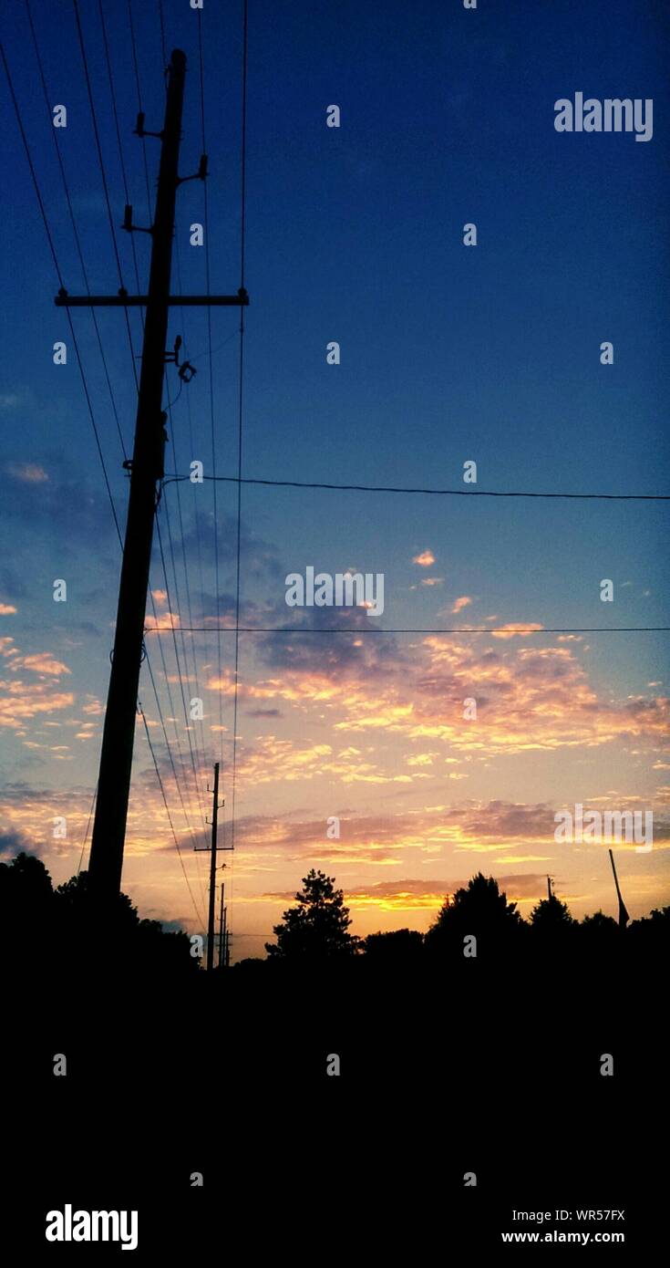 Telephone poles in sunset hi-res stock photography and images - Alamy