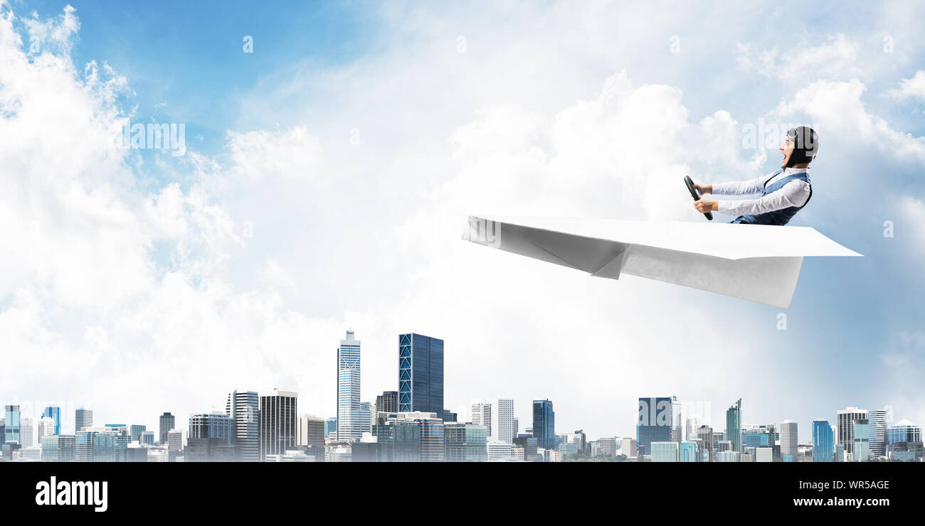 Business motivation concept with pilot sitting in paper airplane. Funny ...