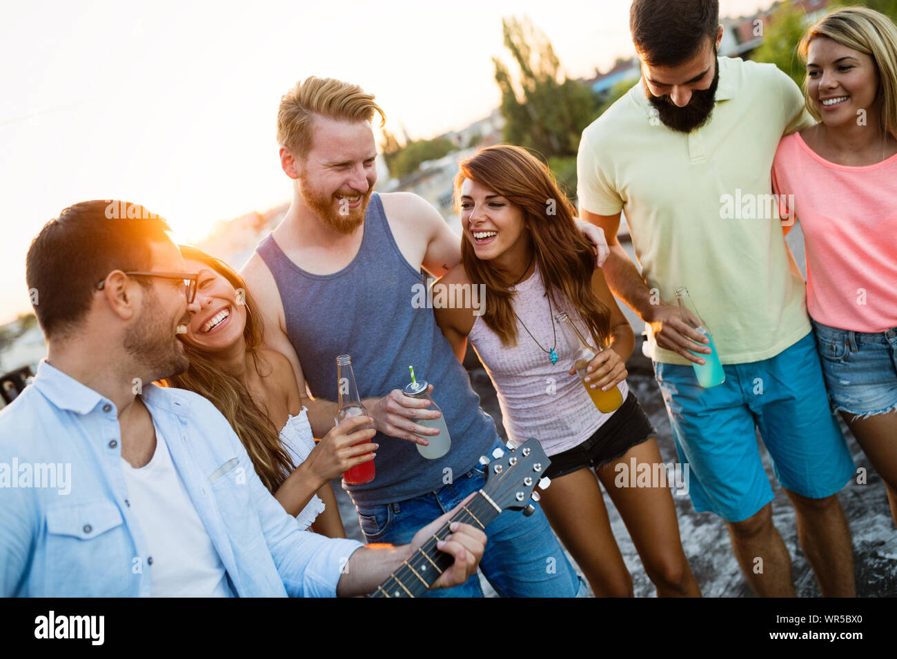 Having a great time with friends, havinf fun at rooftop party Stock ...