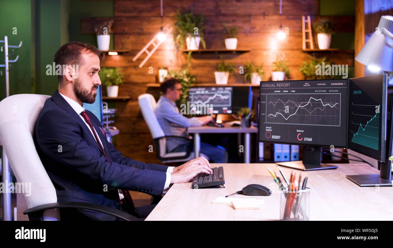 Start up managers working over schedule. Modern office Stock Photo - Alamy