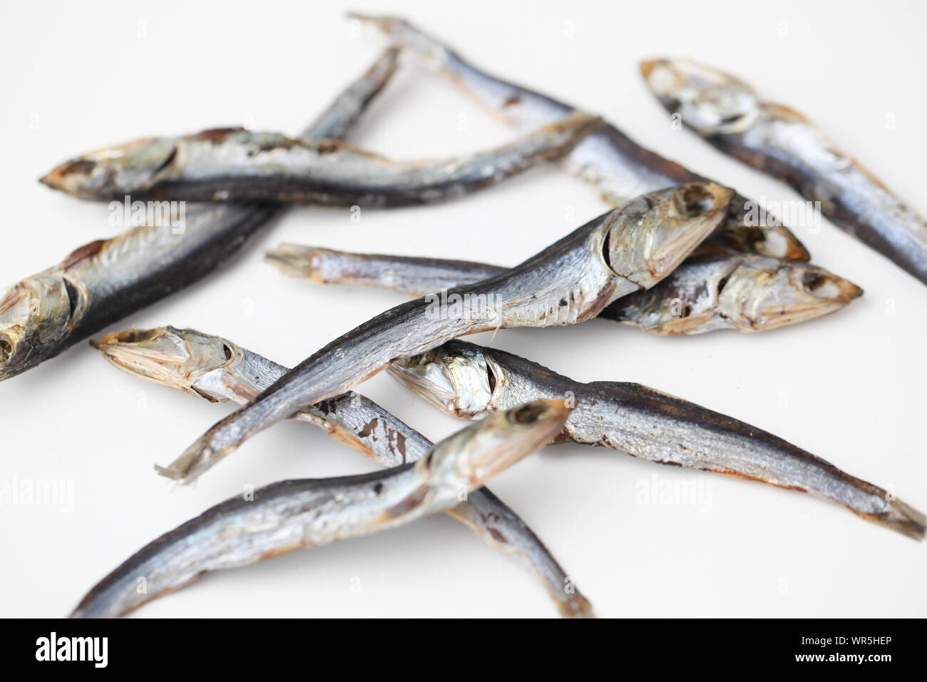 grilled dried fish isolated on white background Stock Photo - Alamy