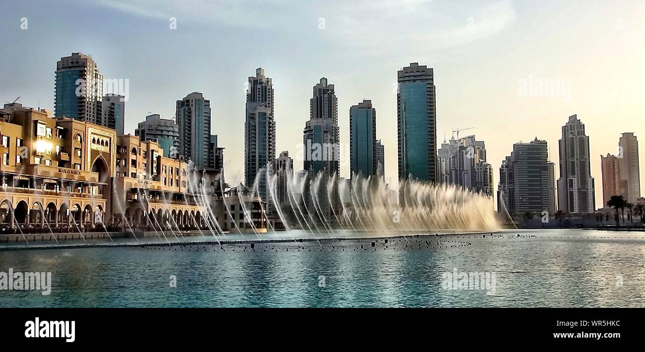 Water Fountain In Front Of Skyscrapers Stock Photo - Alamy