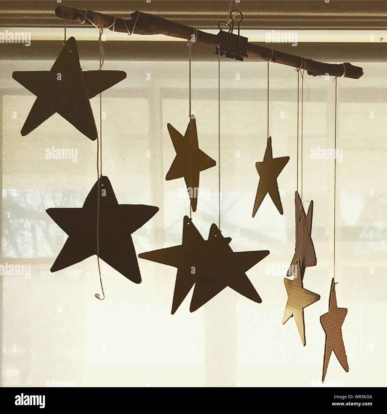 Hanging stars hi-res stock photography and images - Alamy