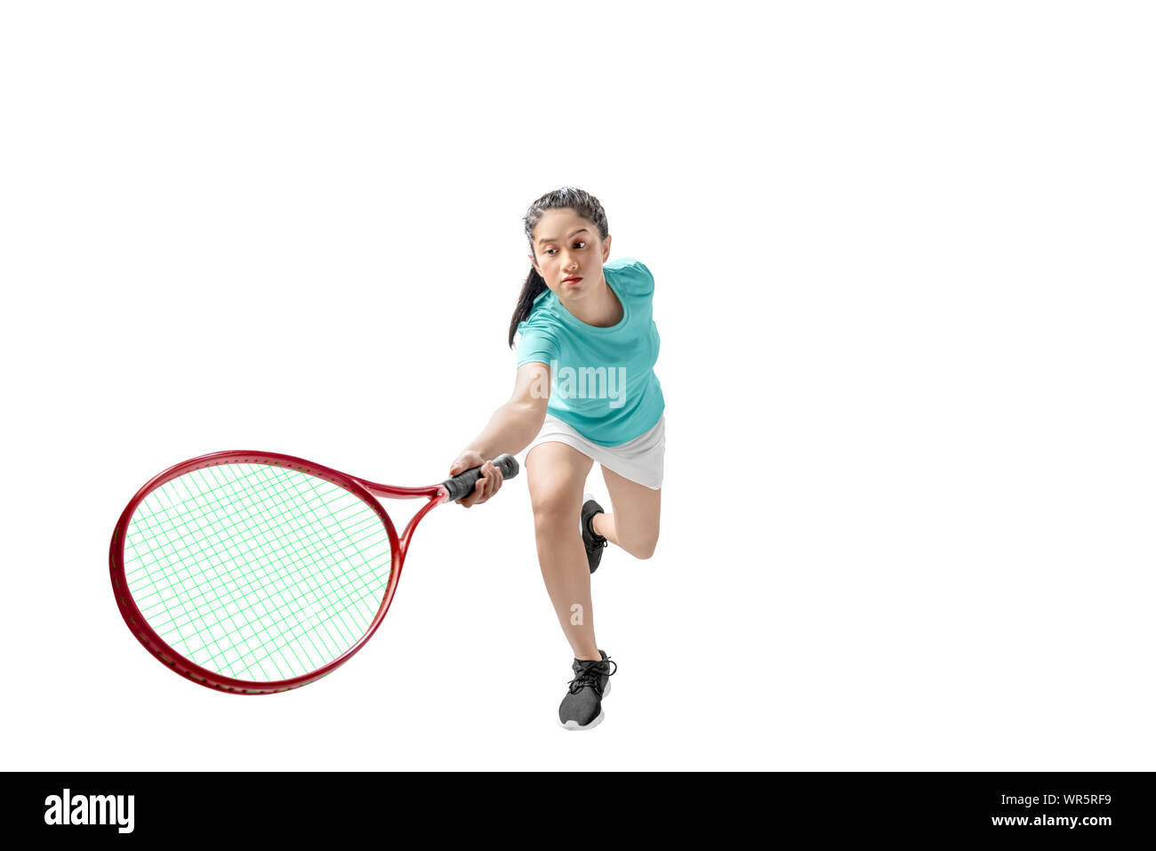 Asian woman swing a tennis racket posing isolated over white background ...
