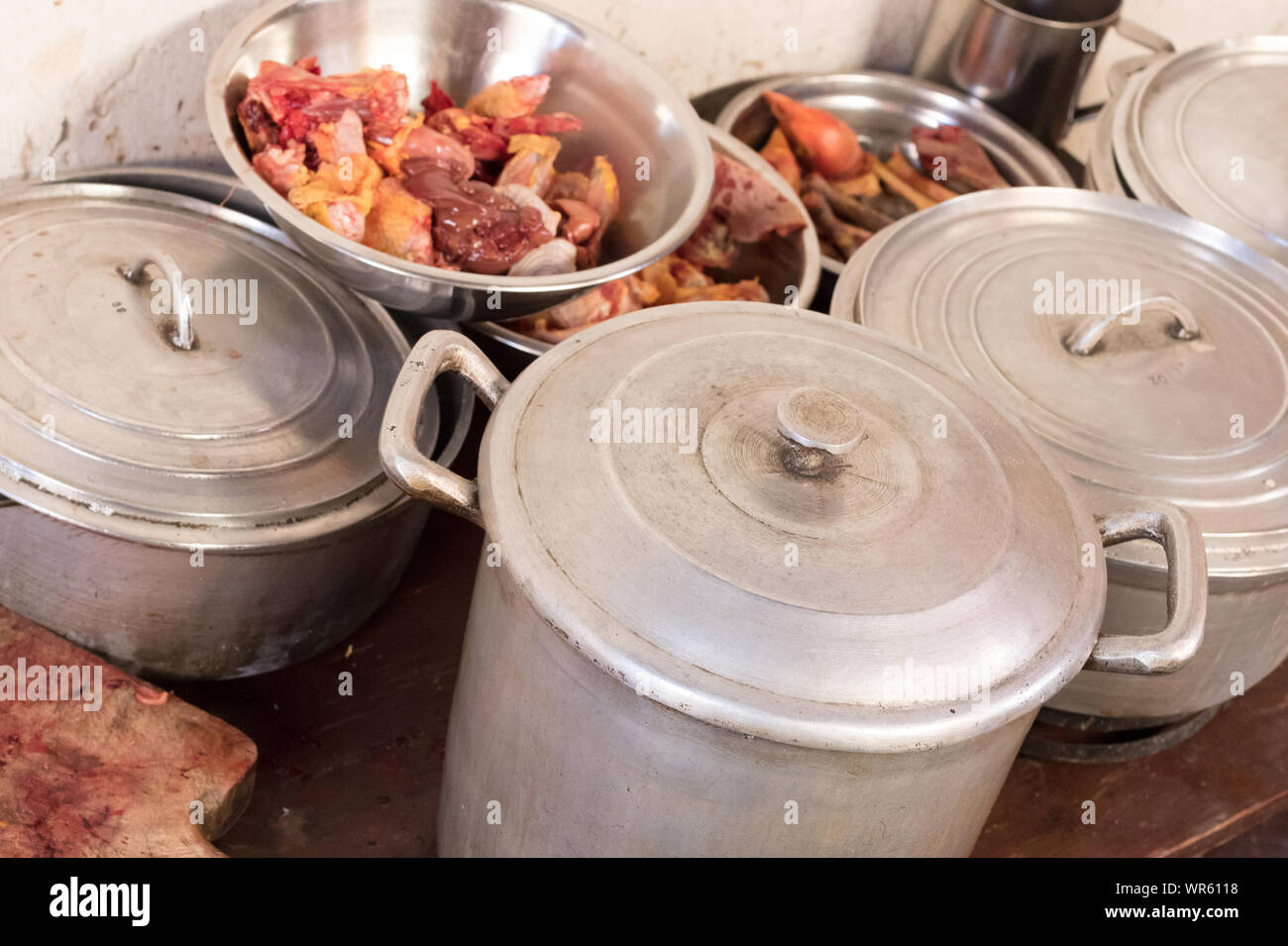 Chopped chicken in a very simple kitchen, selective focussed ...