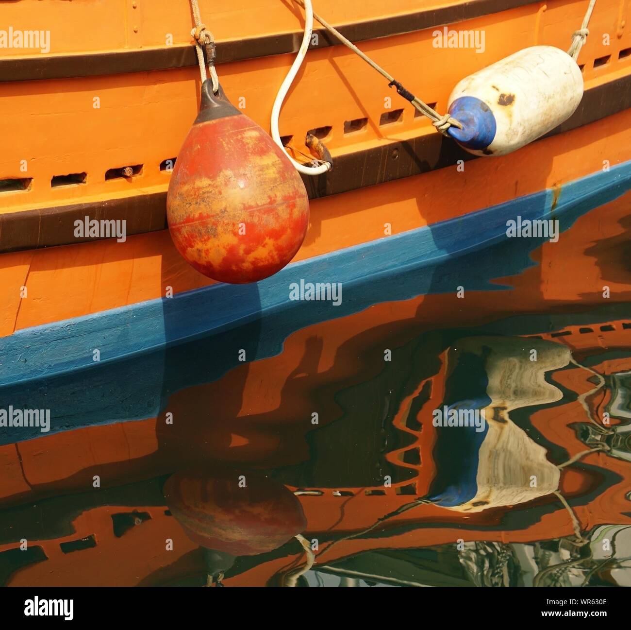 Orange and white boat hi-res stock photography and images - Alamy