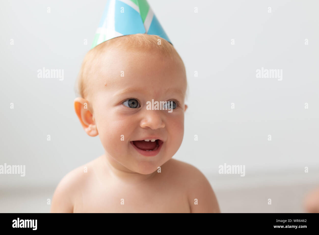 First birthday. Cute baby in a celebrate cap Stock Photo - Alamy