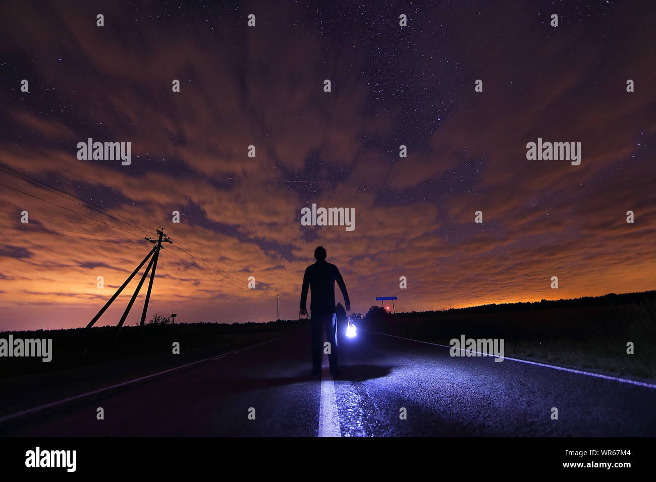 Man with torch hi-res stock photography and images - Alamy