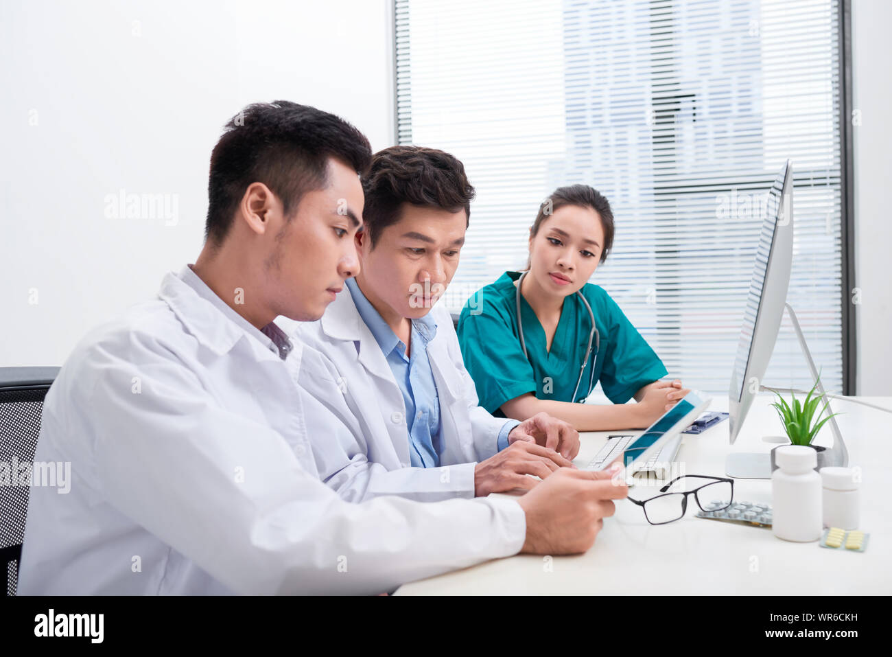 Healthcare people group. Professional doctor working in hospital office ...