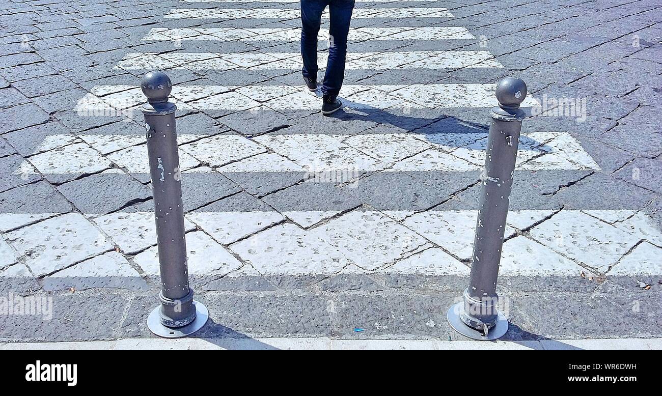 Man crossing zebra on hi-res stock photography and images - Alamy