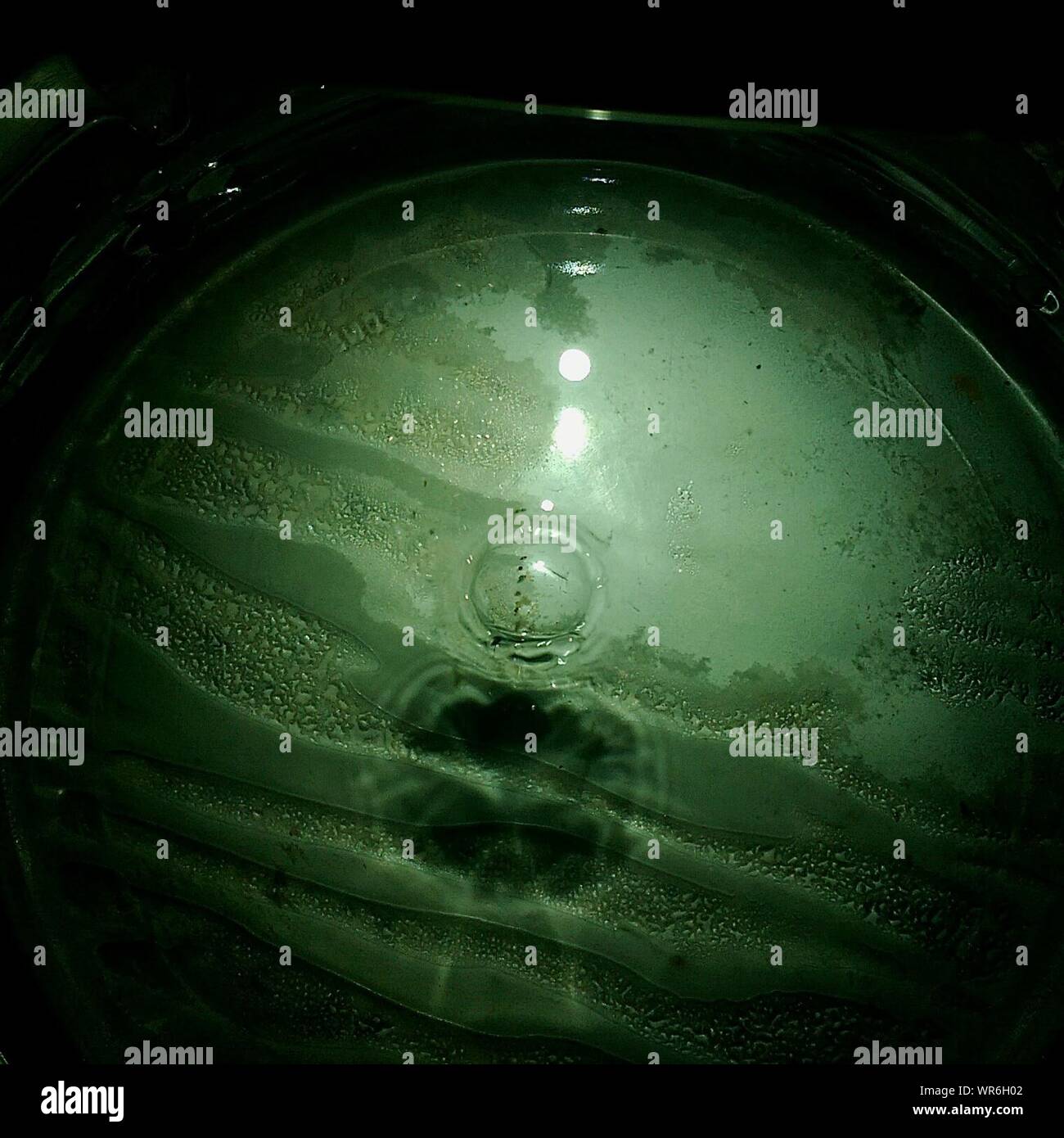 Elevated View Of Bubble On Water Surface Stock Photo - Alamy