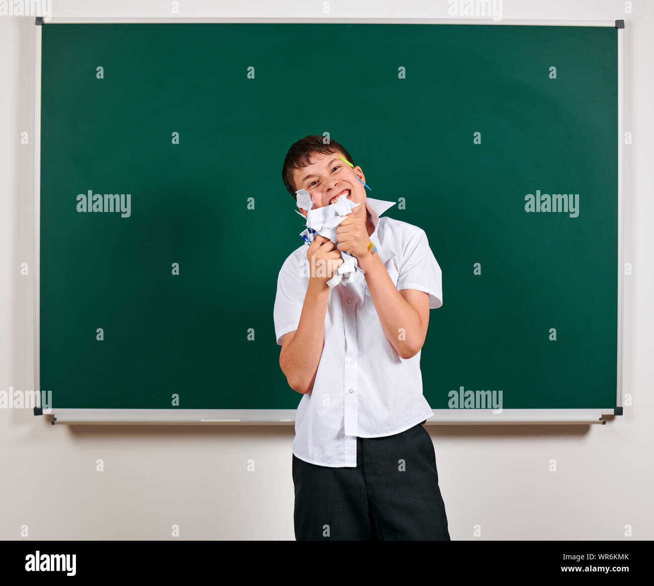 Portrait of funny pupil. School boy very emotional, having fun and very ...