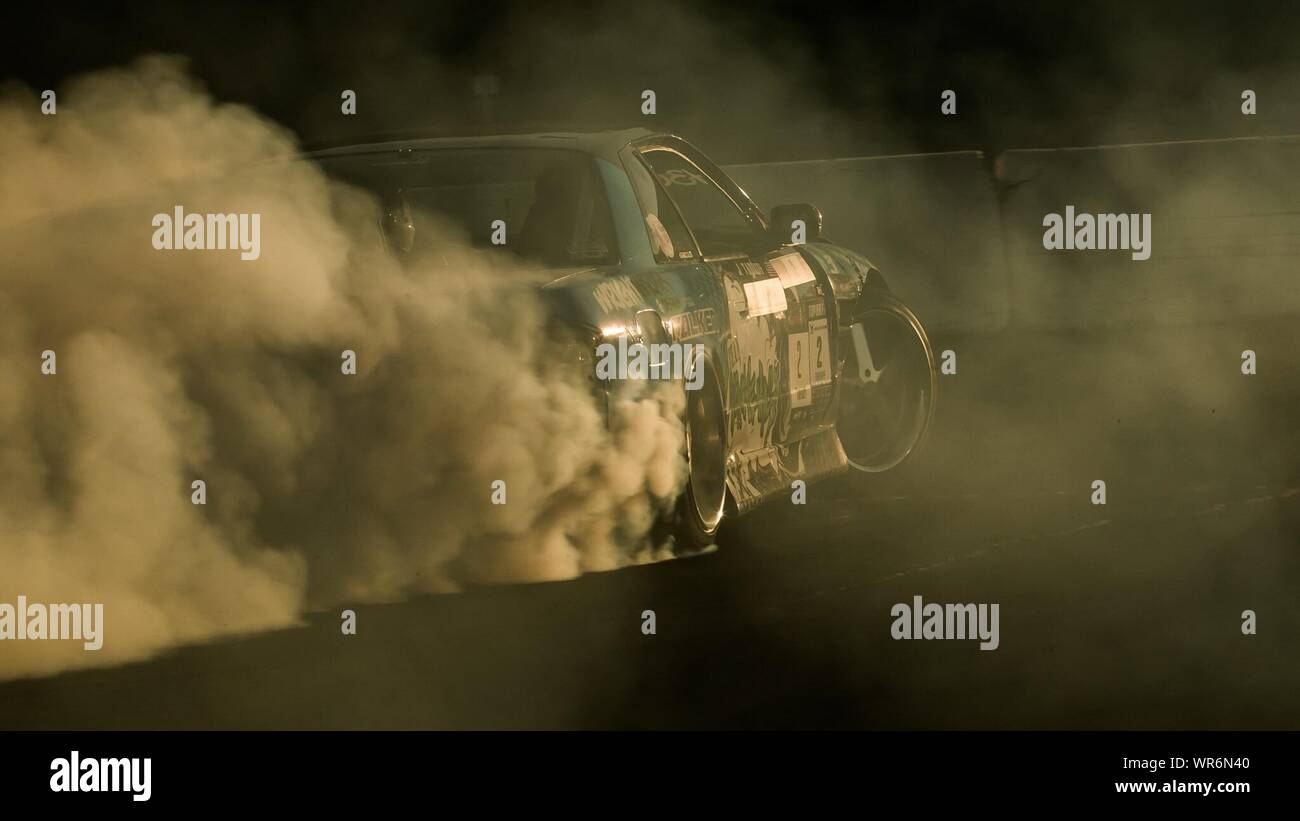 Sport car squealing tires hi-res stock photography and images - Alamy