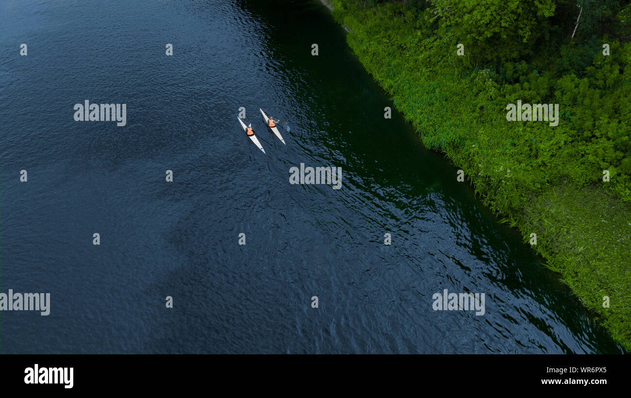 two swimmers floating down the river the view from the drone Stock ...