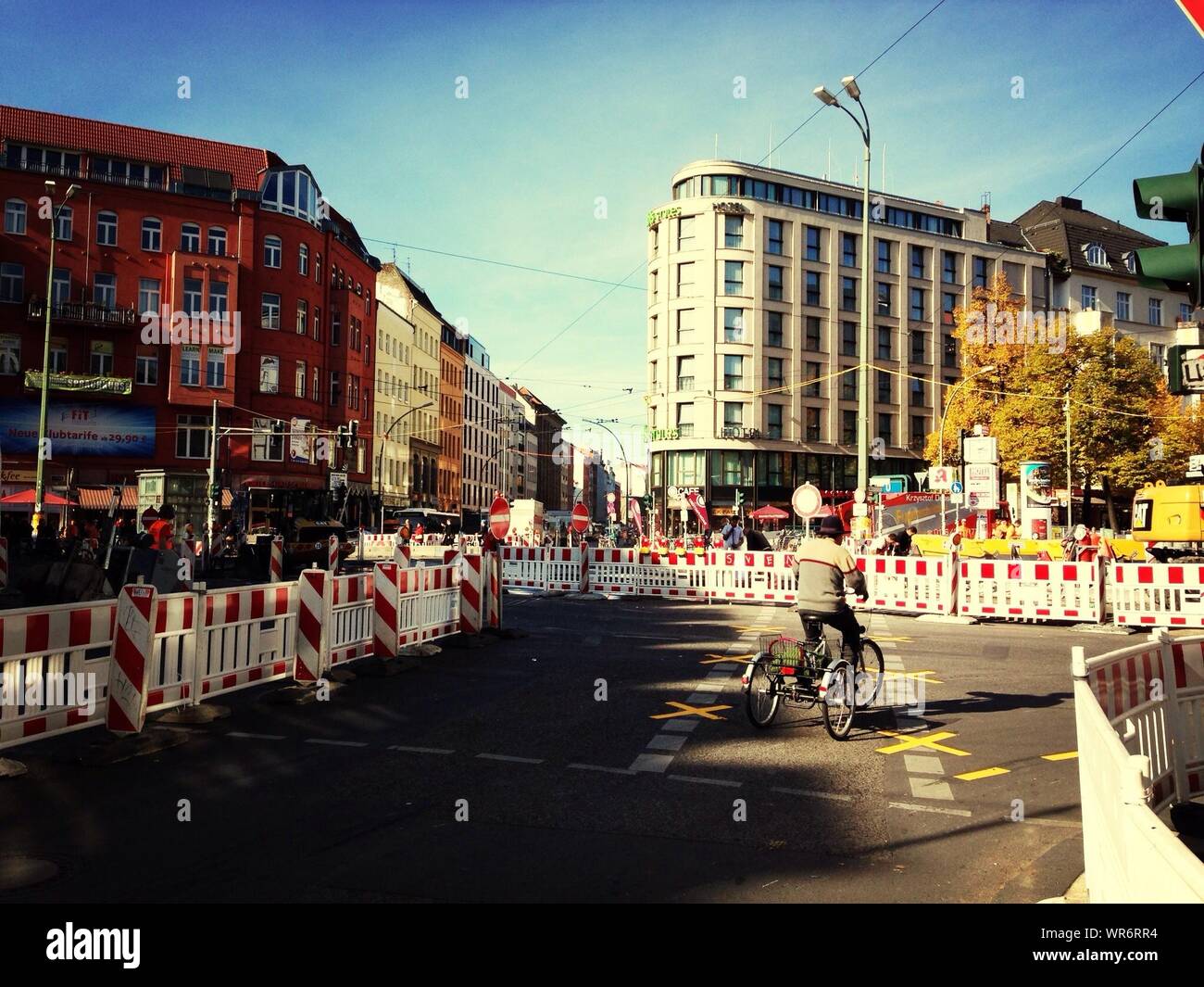 Man riding tricycle on street hi-res stock photography and images - Alamy