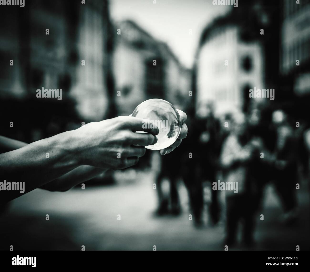 Hands holding ball hi-res stock photography and images - Alamy