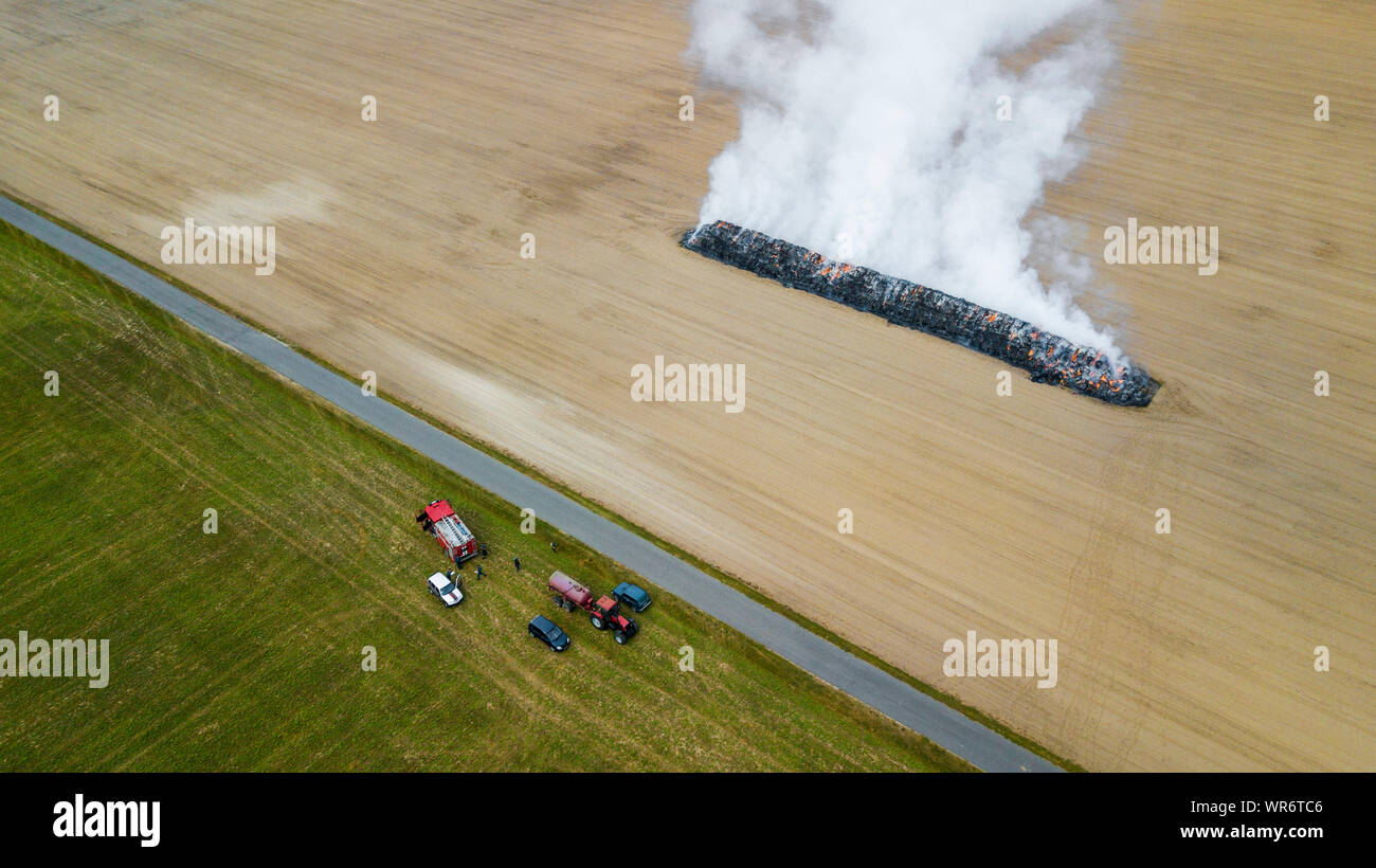 fire in the field top view from the drone Stock Photo - Alamy