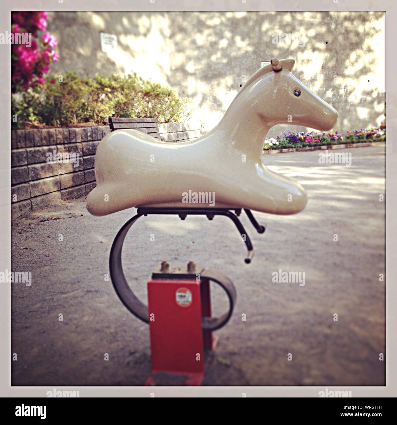 Playground rocking horse hi-res stock photography and images - Alamy