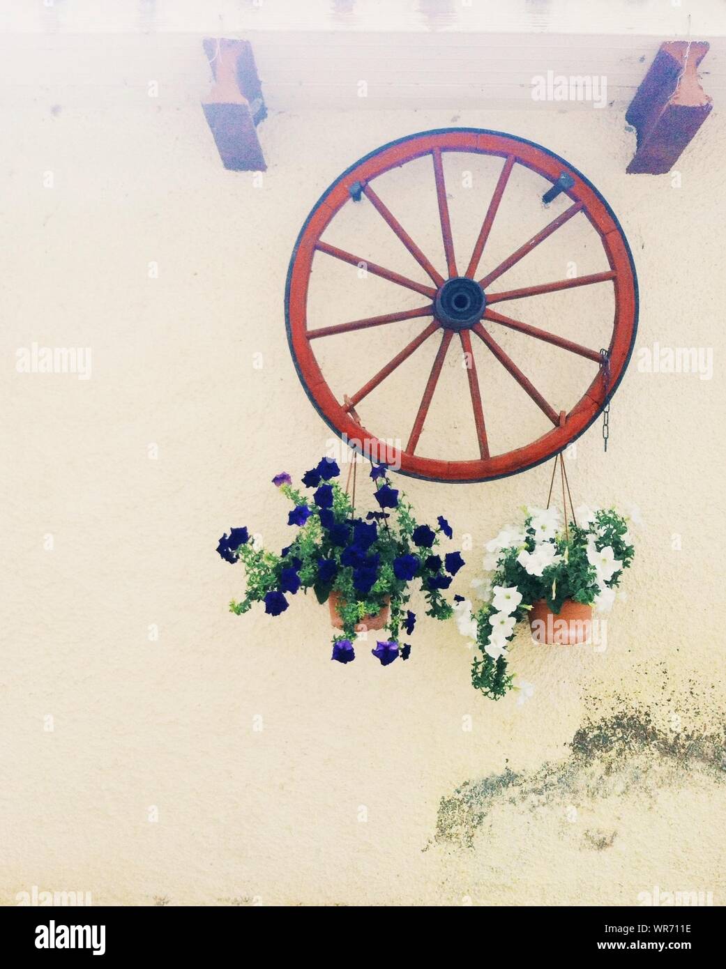 The wheel hanging on the wall hi-res stock photography and images - Alamy