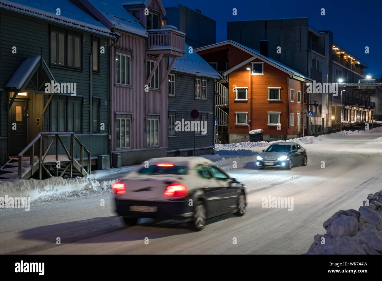 Car driving slowly street hi-res stock photography and images - Alamy