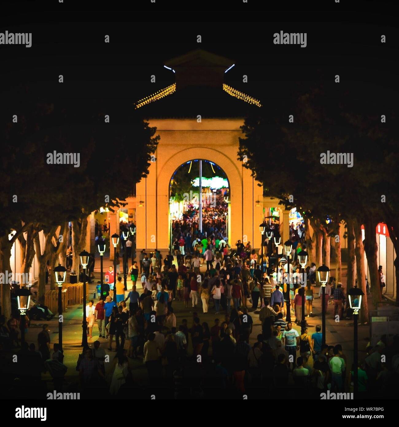 Crowd At Gateway During Night Stock Photo - Alamy
