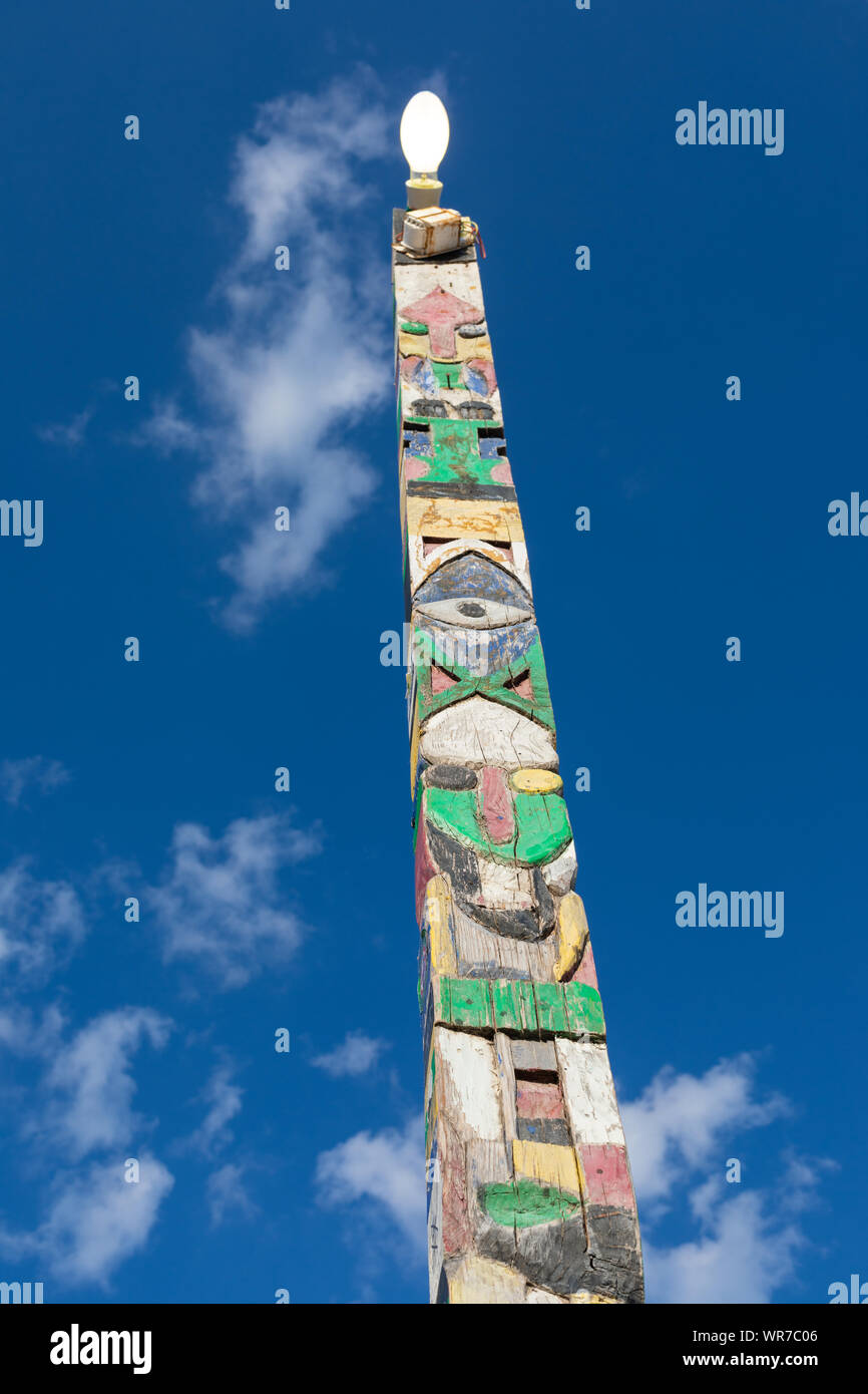 Wooden totem against blue sky at Janis club at the seaside, Vama Veche ...
