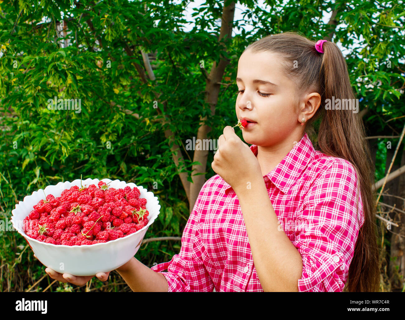 Teen Eat Fruit Garden High Resolution Stock Photography and Images - Alamy