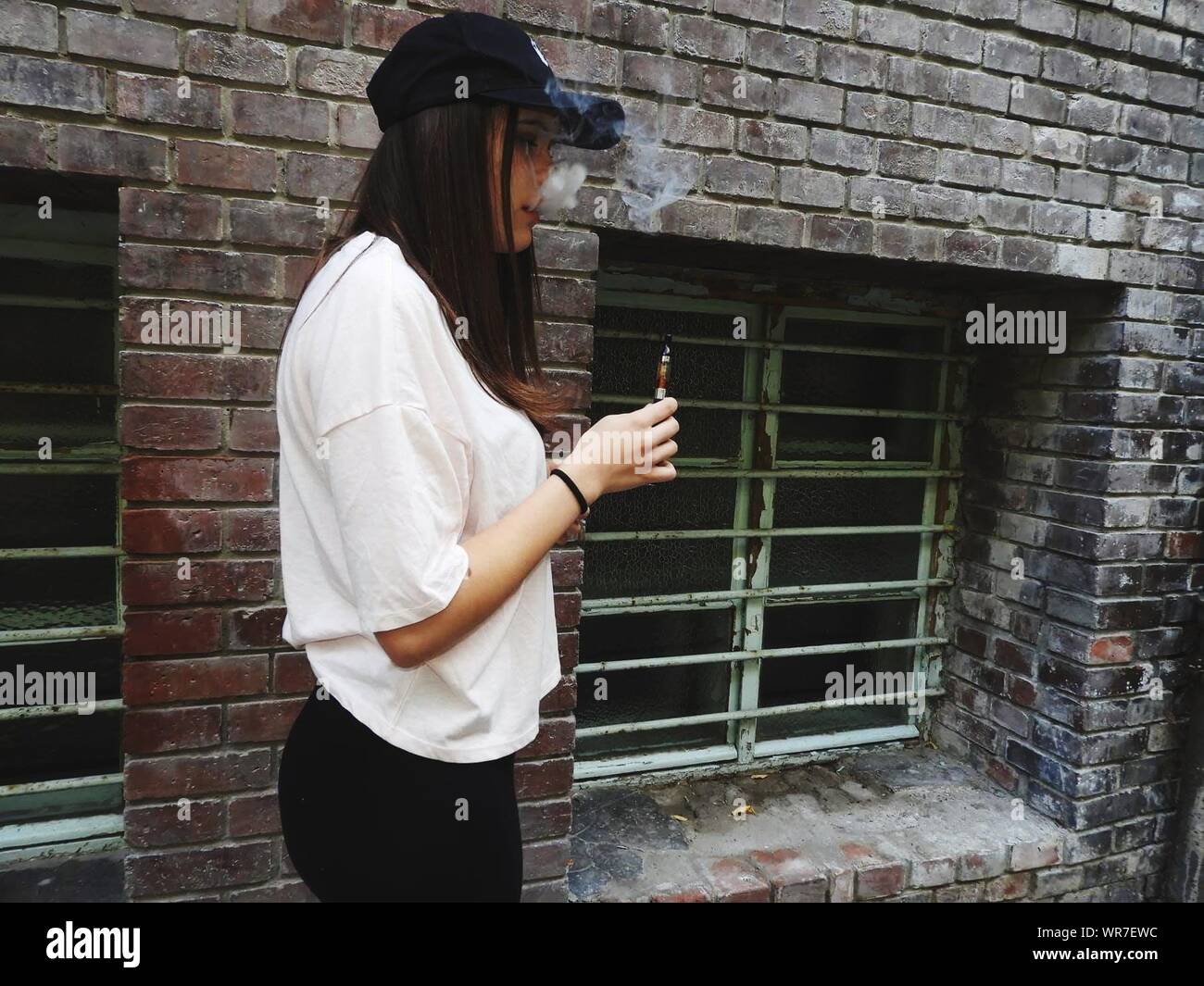 Woman Smoking Side View High Resolution Stock Photography and Images ...