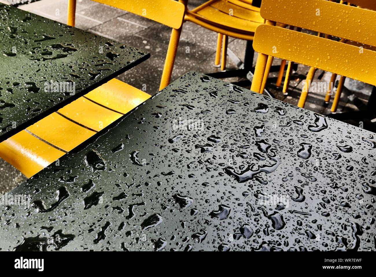 Wet tables and chairs hi-res stock photography and images - Alamy