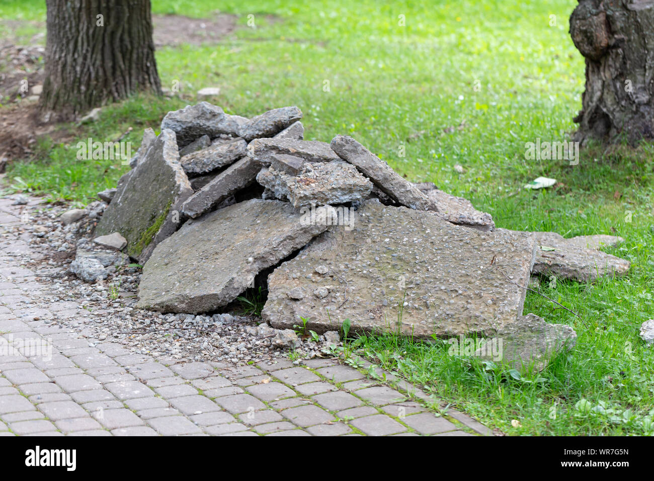 pavement renovation with rubble on the lawn Stock Photo - Alamy