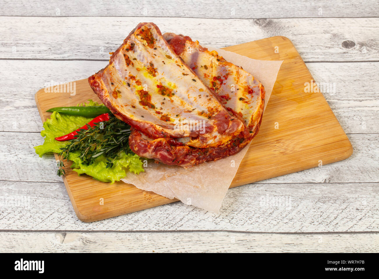 Marinated Raw pork ribs for grill Stock Photo - Alamy