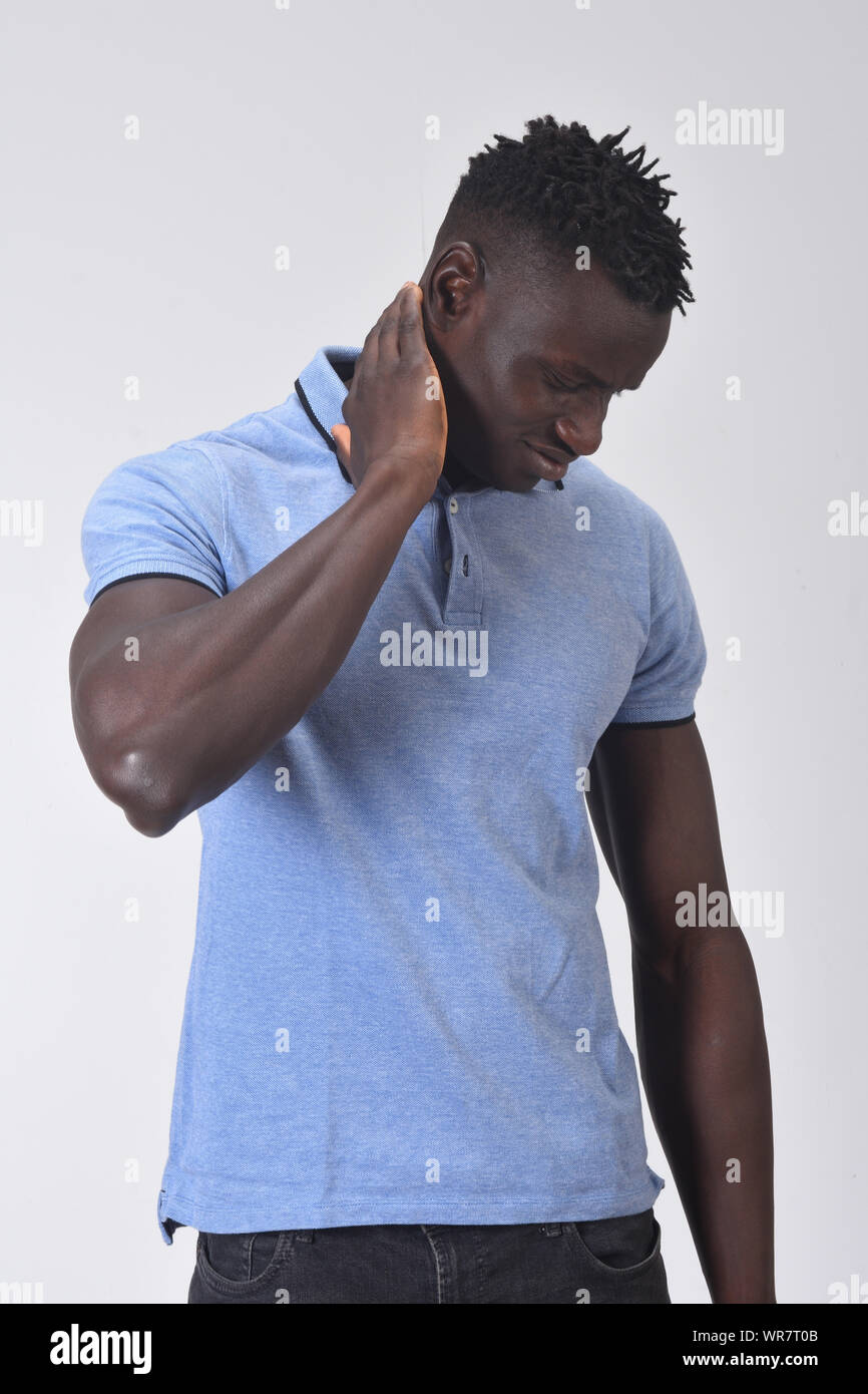 man with pain on nape on white background Stock Photo - Alamy