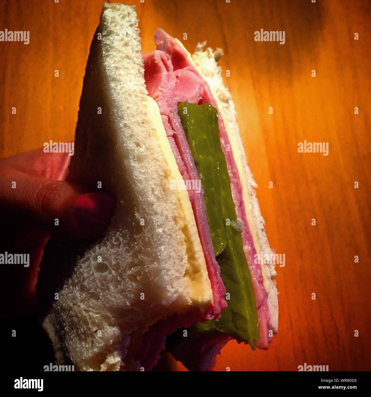 Person eating sandwich hi-res stock photography and images - Alamy