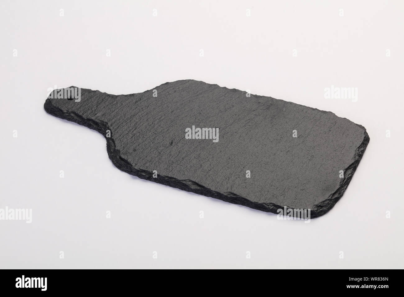 Stone board for serving dishes - kitchenware Stock Photo - Alamy