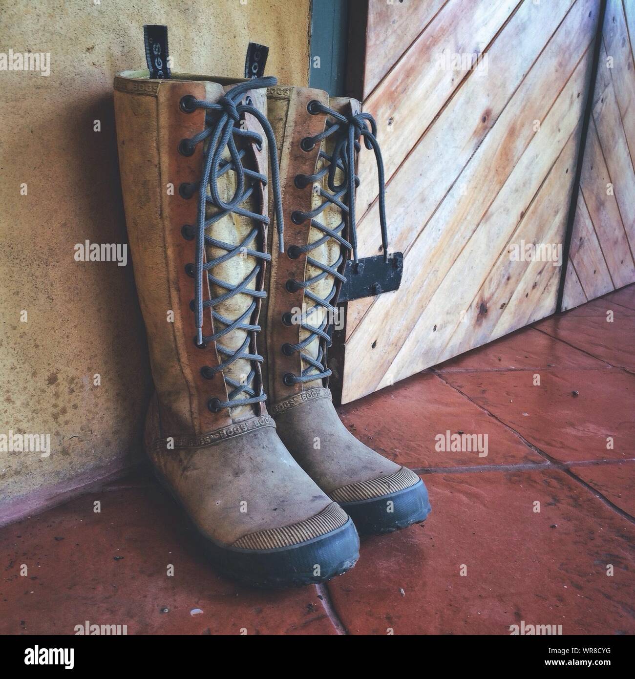 Tied boots hi-res stock photography and images - Alamy