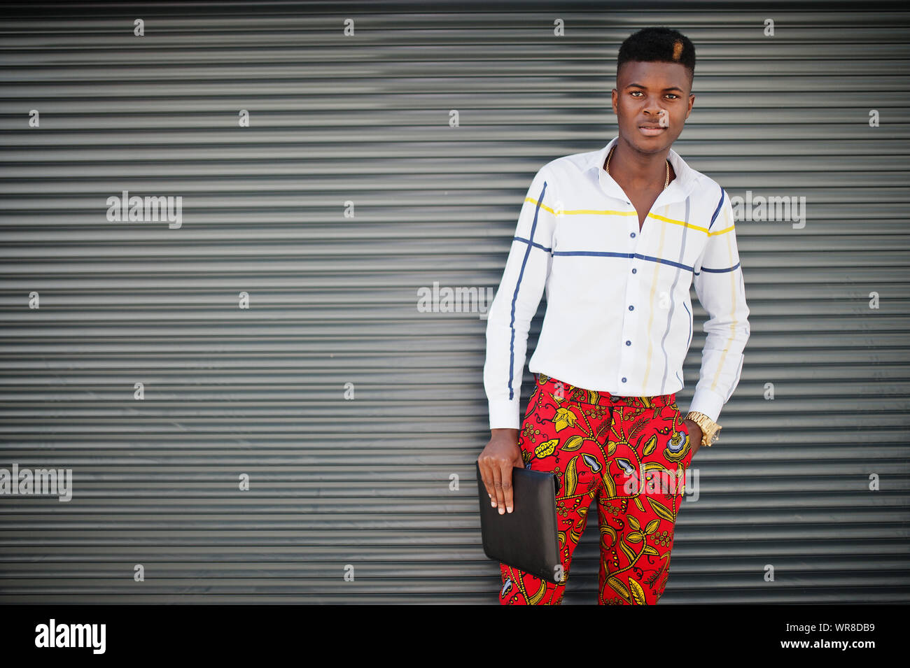 Portrait of handsome stylish african american model man in red ...