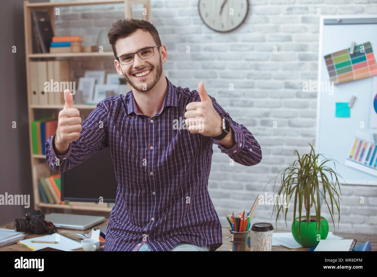 Graphic designer small business home office concept thumbs up Stock ...
