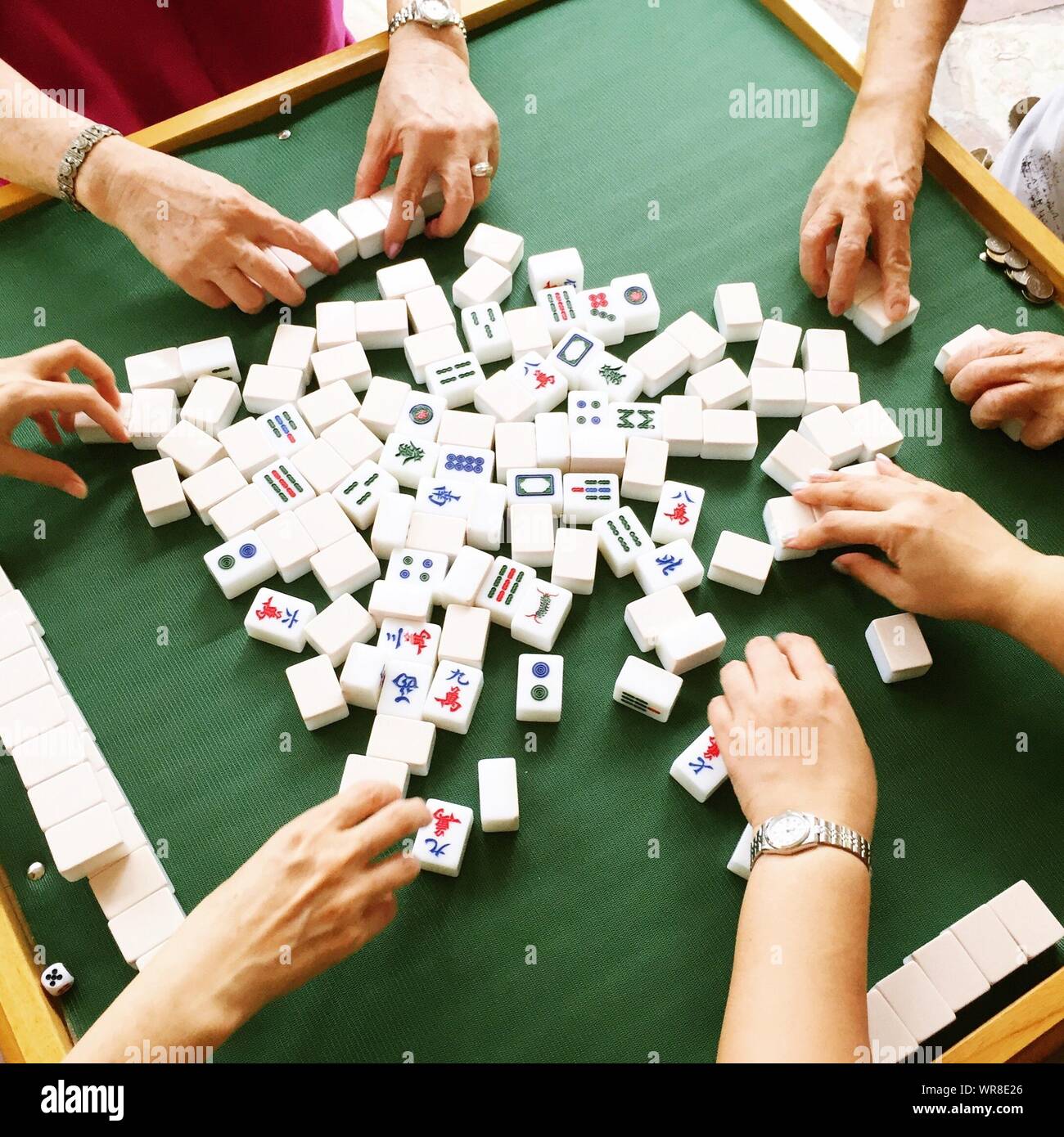 Women playing mahjong tiles hi-res stock photography and images - Alamy