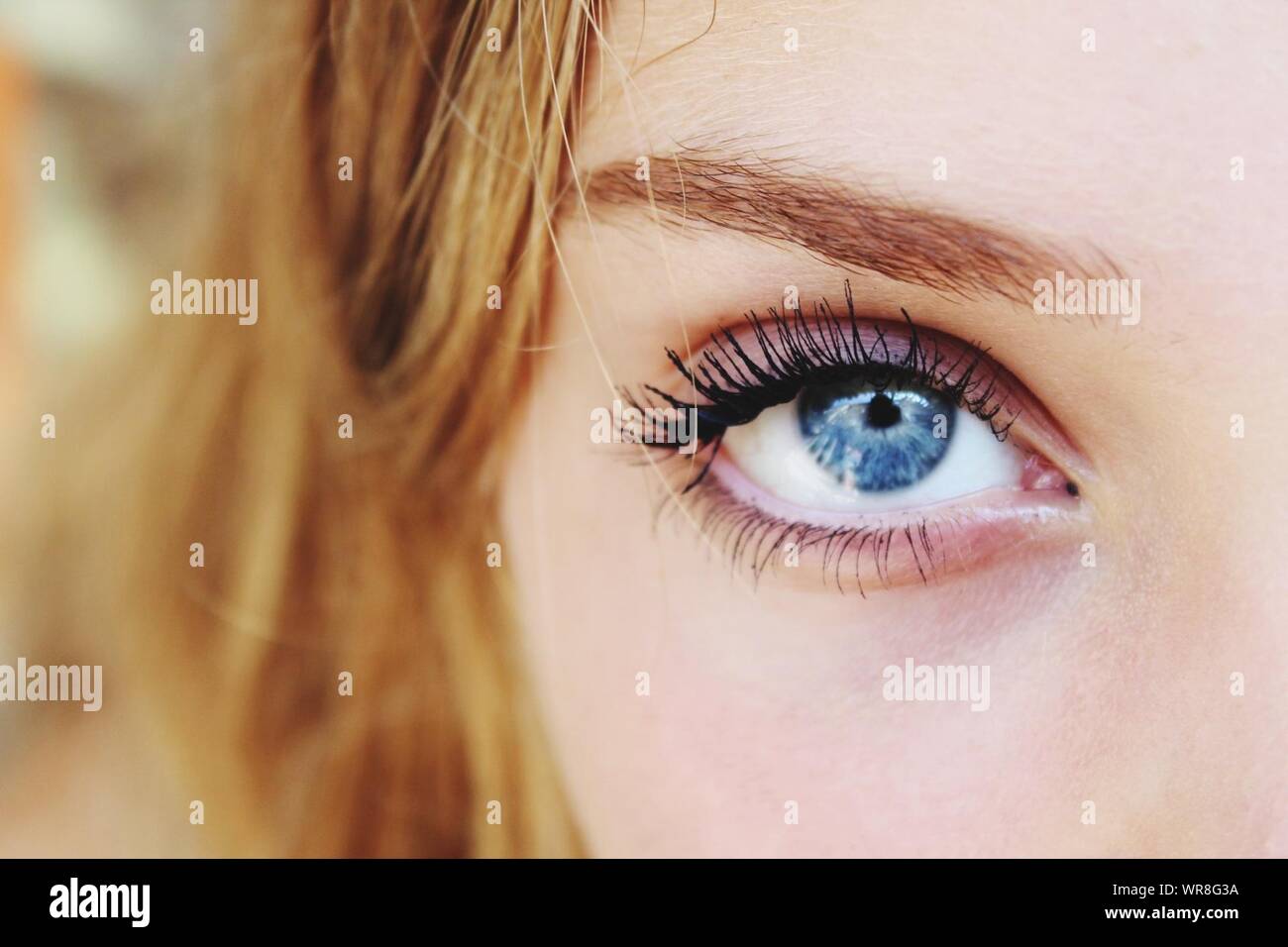 Blue eyes woman close up hi-res stock photography and images - Alamy