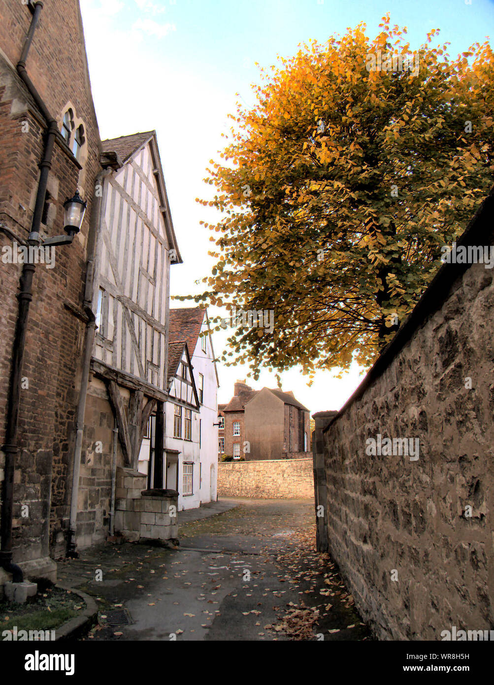 Old Building Along Alley In Town Stock Photo - Alamy