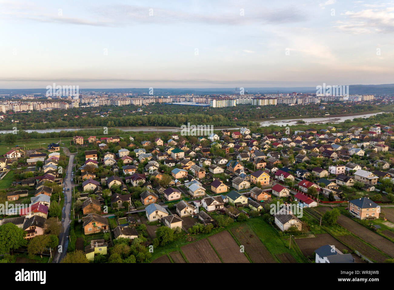 Aerial landscape of small town or village with rows of residential ...
