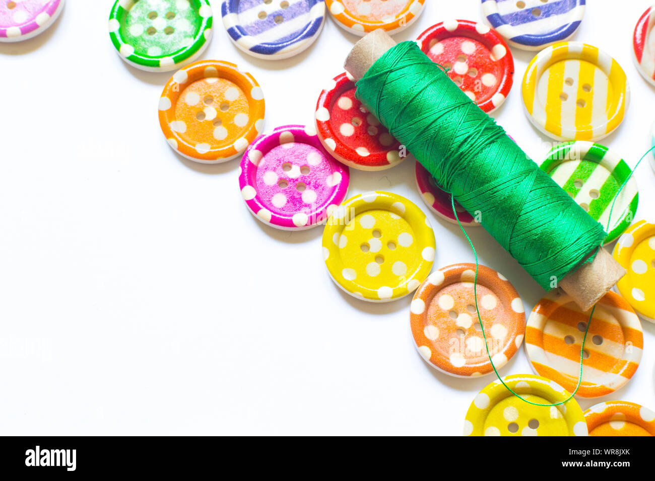 .Various sewing buttons isolated on white background Stock Photo - Alamy